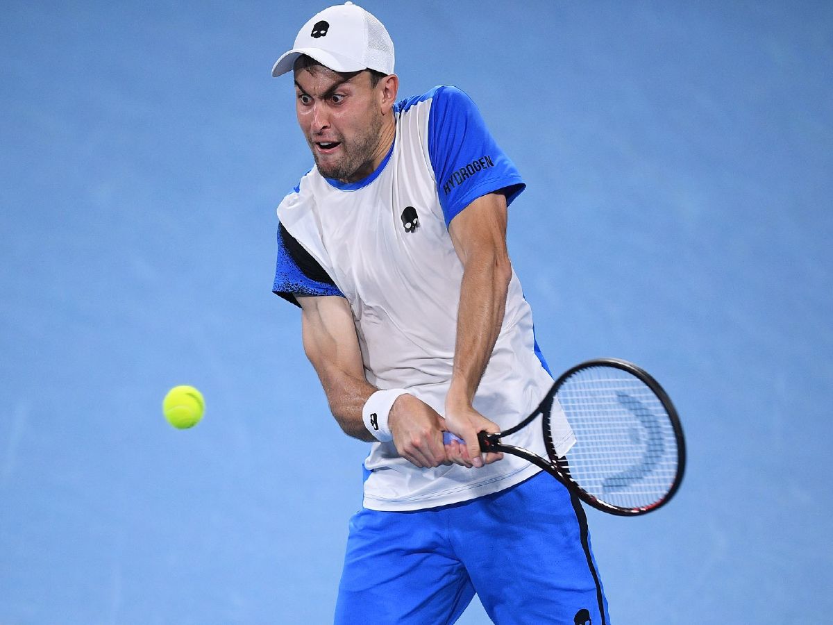 Qatar Open: Dan Evans advances into second round with straight sets win ...