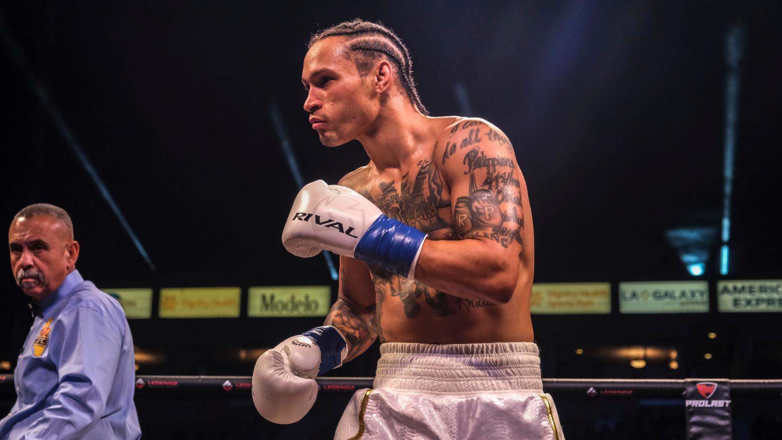 Regis Prograis only just manages to retain his title with split ...